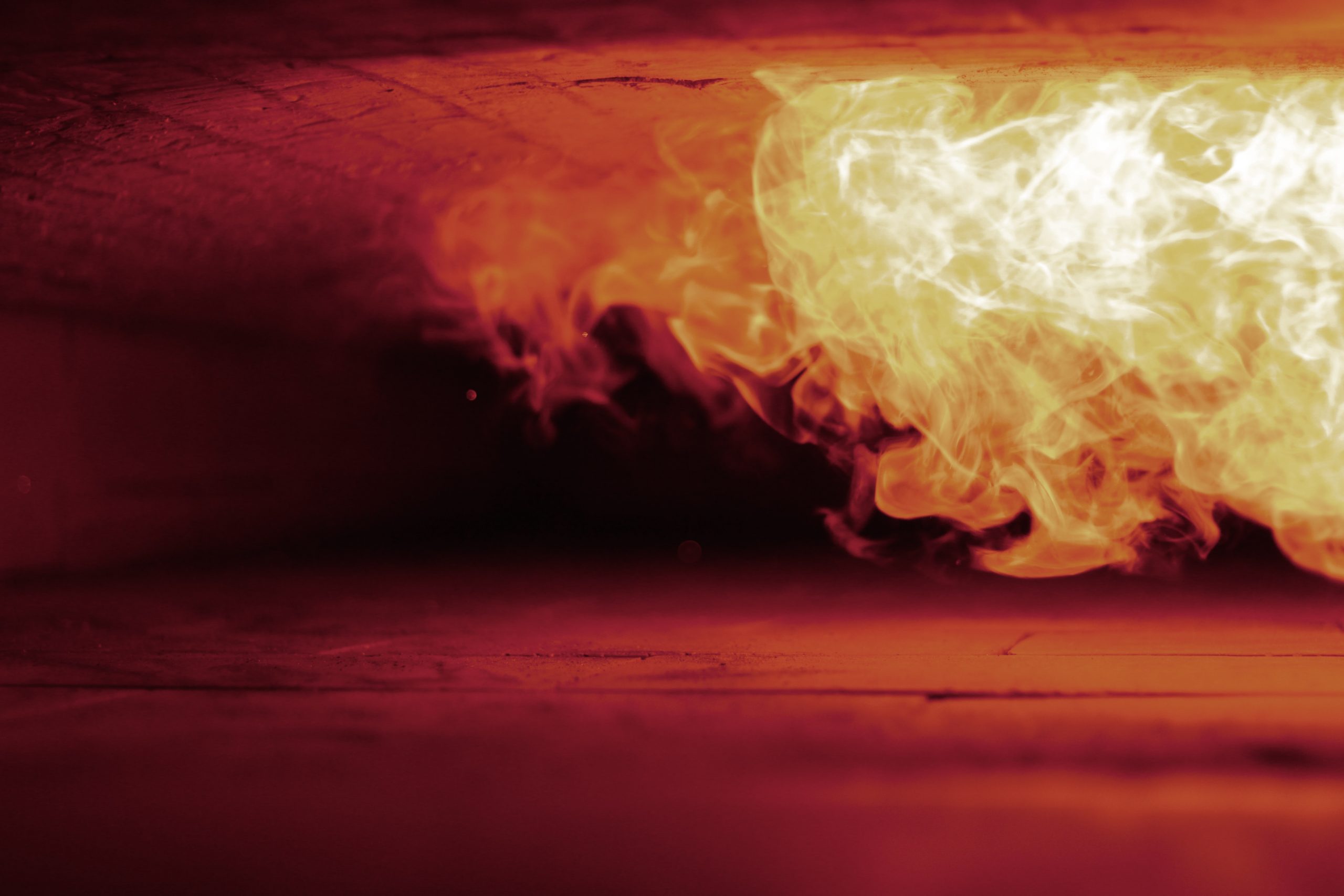 Flames heating up the bricks inside the oven – Refractory Till CC